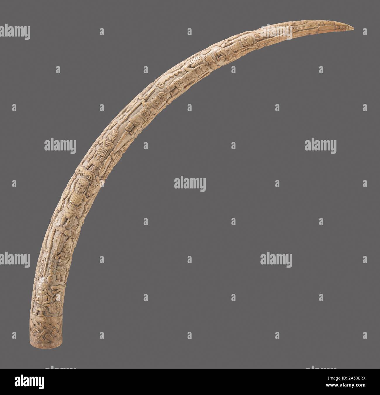 Carved Tusk, c. 1820. Consisting of a clay platform built against a ...
