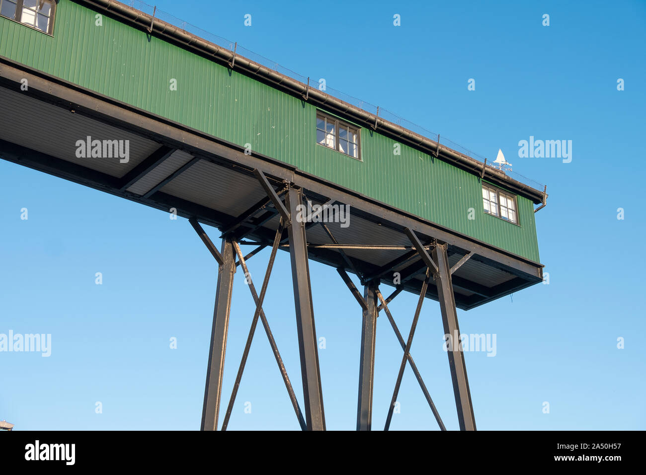 Old granary building gantry structure Stock Photo - Alamy