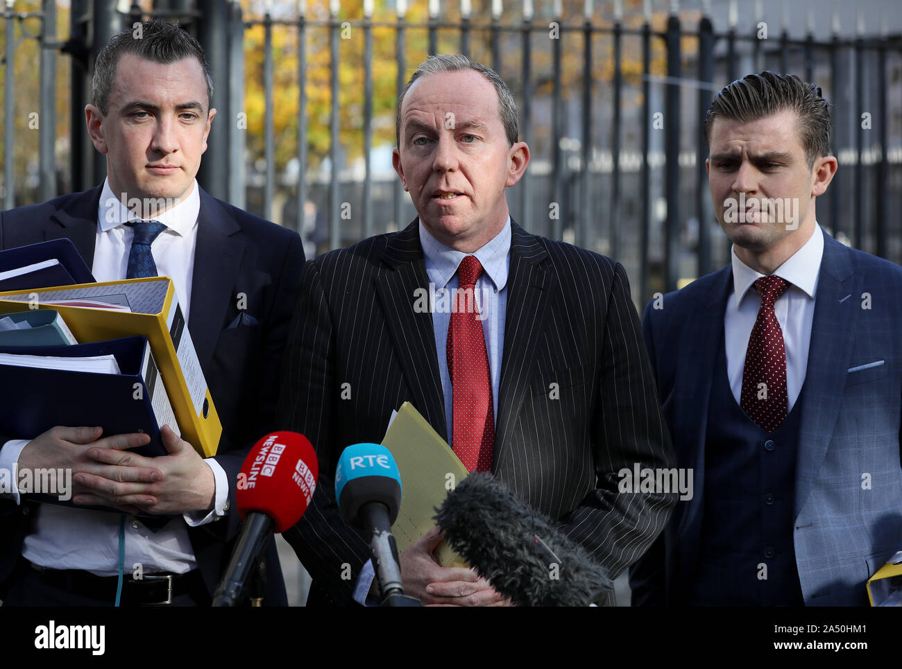 Peter Corrigan (centre), solicior for Ivor Bell, speaks to the media ...