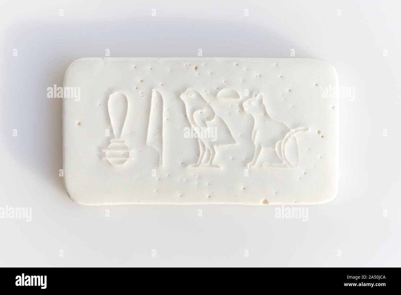 clay tablet with the inscription cat in ancient egyptian. modern ...