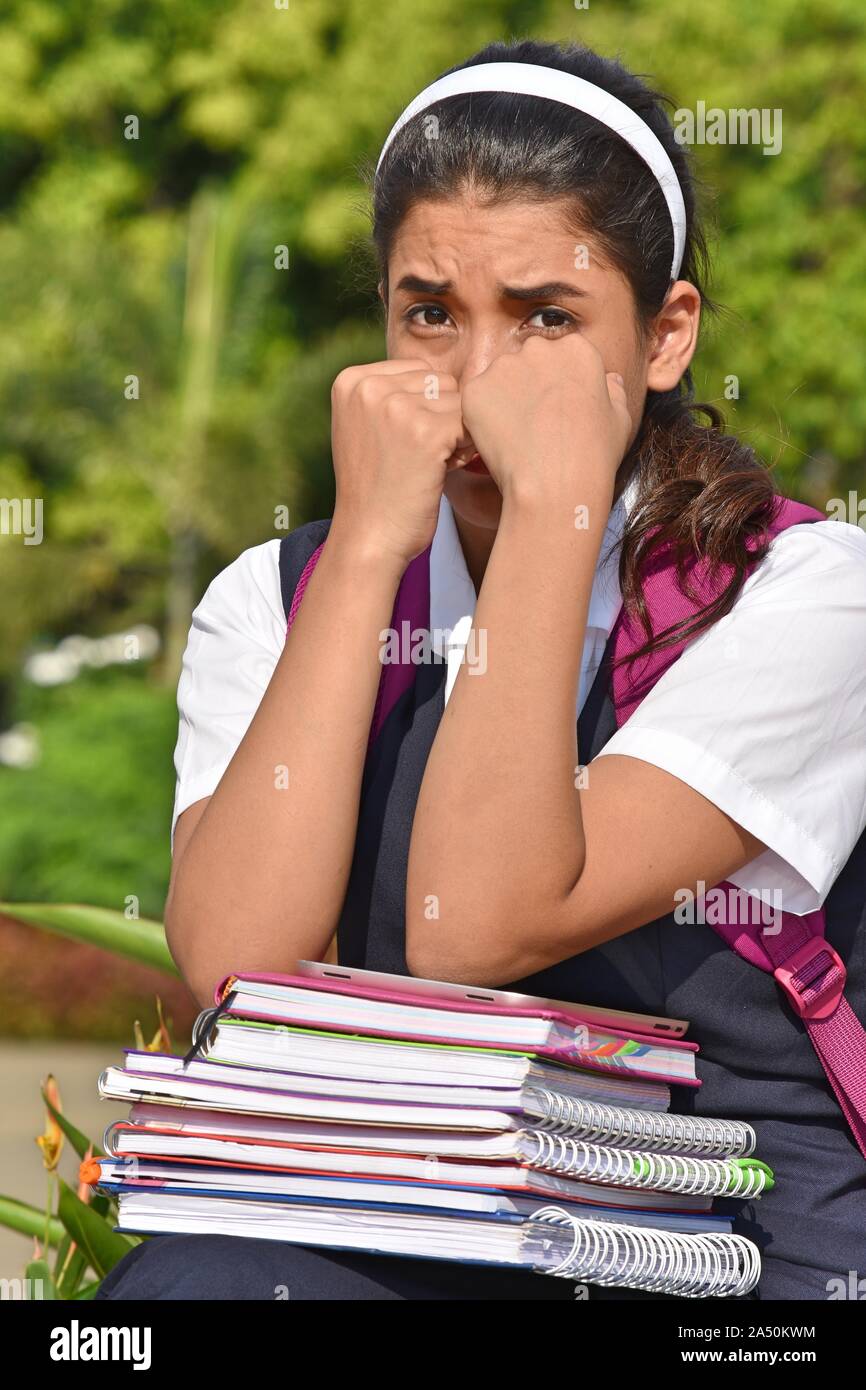 Female Student Afraid With Notebooks Stock Photo - Alamy