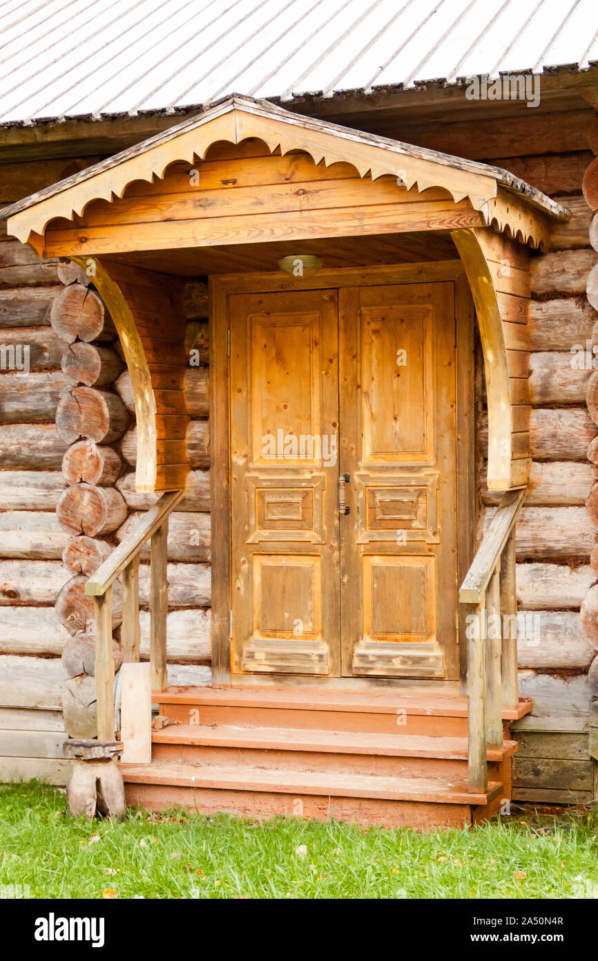 Wooden porch entrance door with architectural decorative elements wood ...