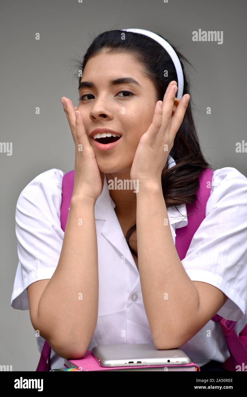 Talking Cute Colombian Girl Student With Notebooks Stock Photo - Alamy