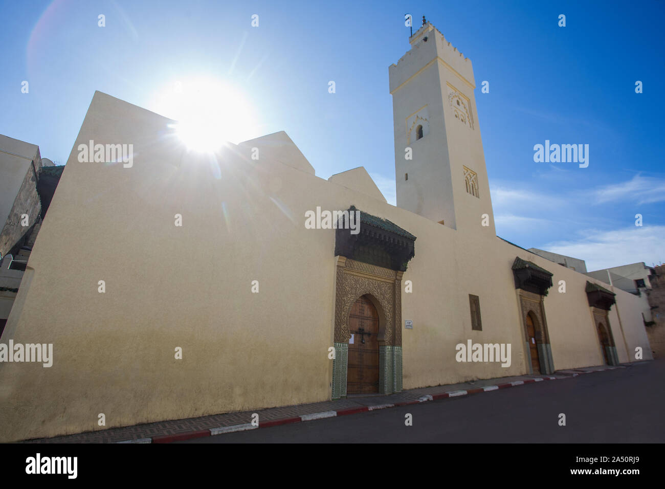 mosque in the city of Fez. Sun rays Stock Photo - Alamy