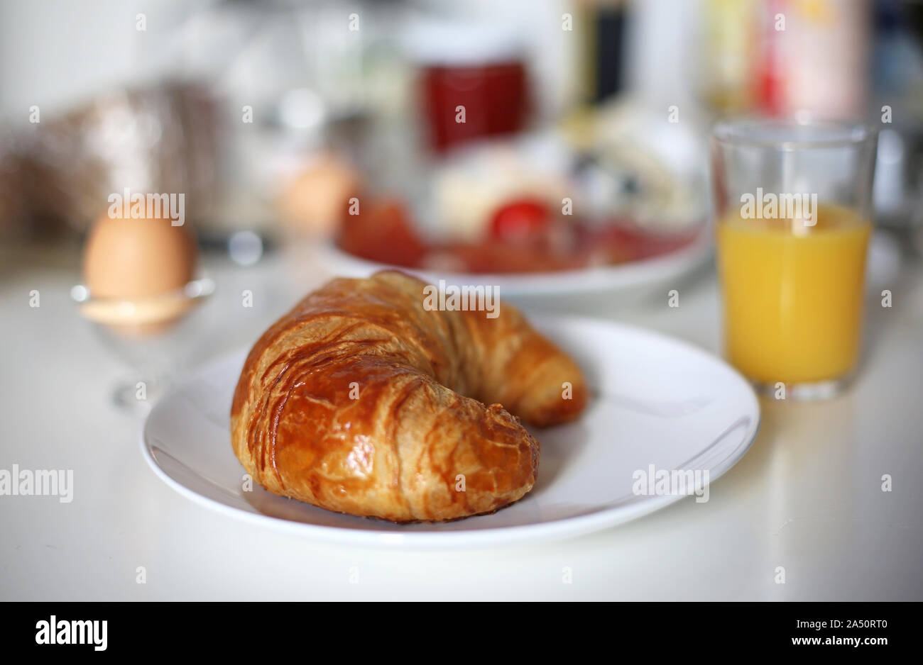 European breakfast with croissant and orange juice Stock Photo - Alamy