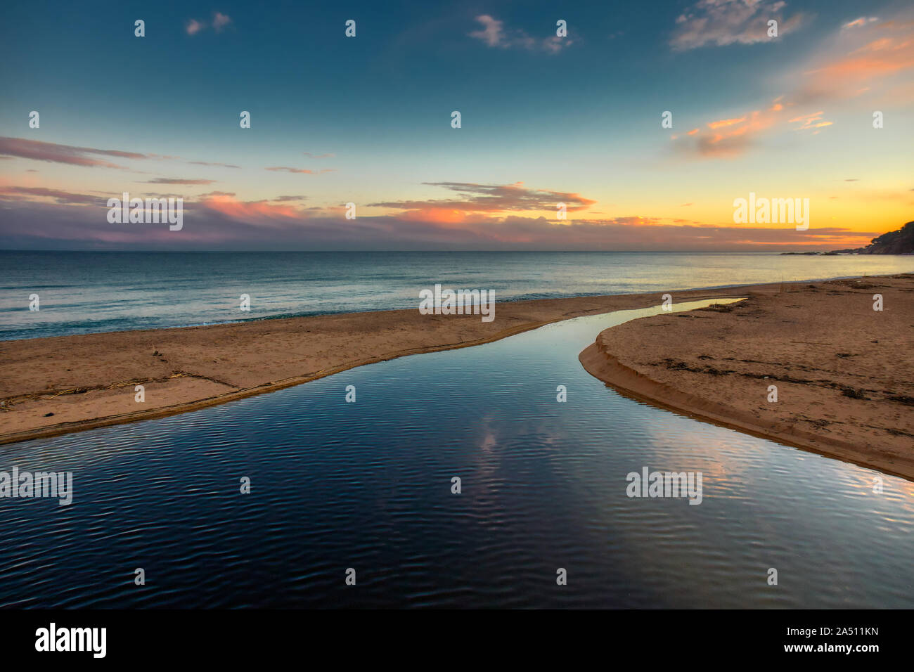 Nice sunset picture from Spanish beach in Costa Brava Stock Photo - Alamy