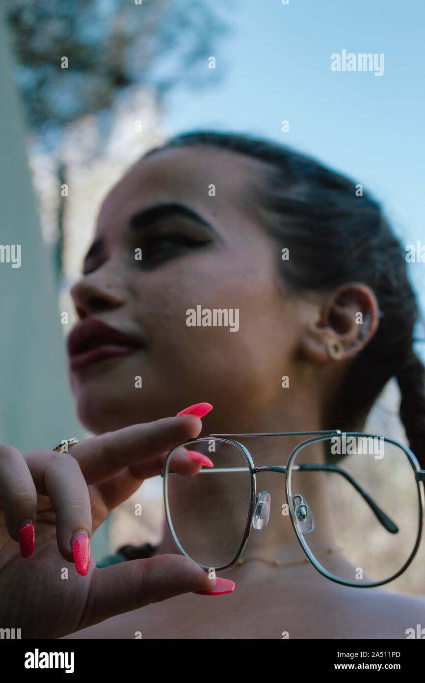 Pretty woman female young face hand hi-res stock photography and images ...