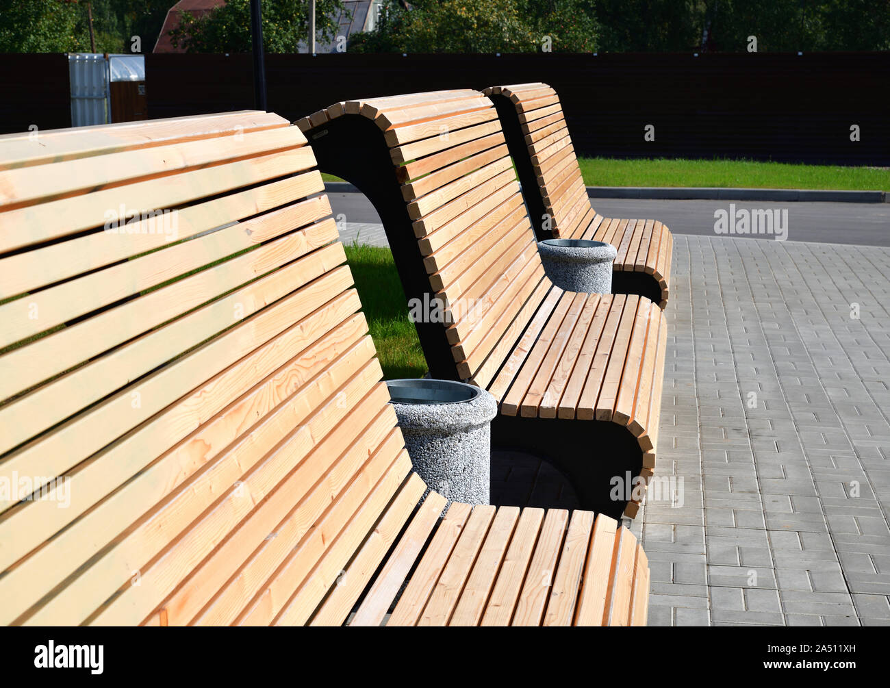 Beautiful wooden benches in a city park in Moscow, Russia Stock Photo ...