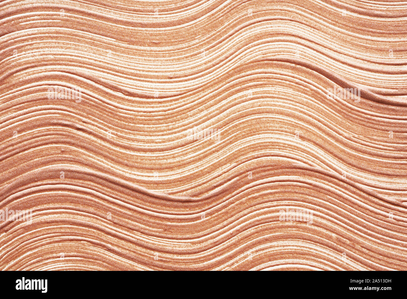 Soft gold texture and strokes of face highlighter or acrylic paint ...