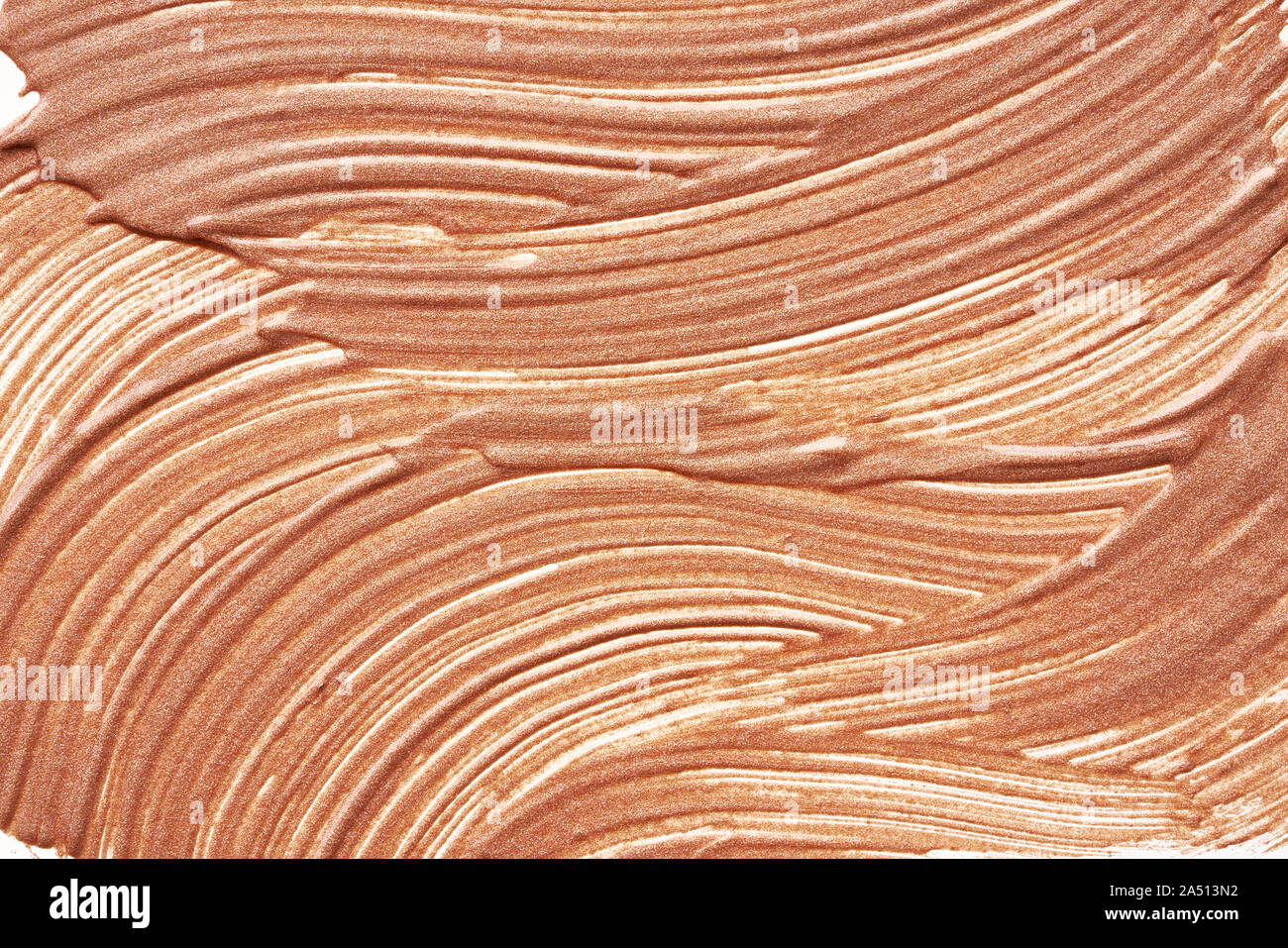 Soft gold texture and strokes of face highlighter or acrylic paint ...