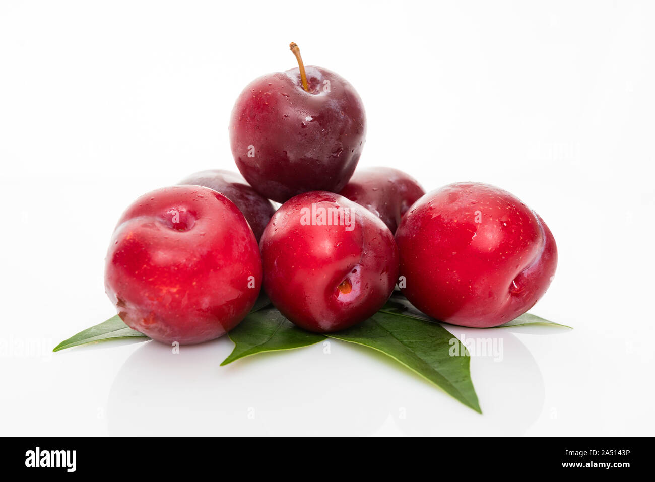 fresh plum isolated on white background Stock Photo - Alamy