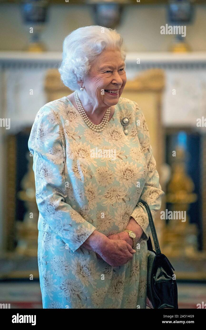 Queen Elizabeth II hosts a reception at Buckingham Palace in London, to ...