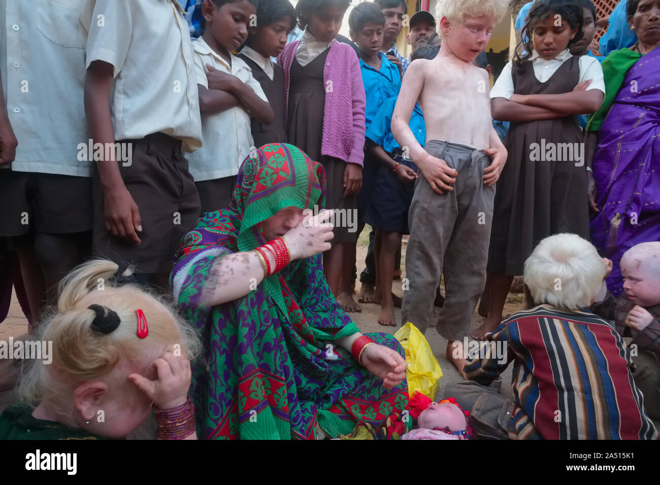 Members of an extended Indian albino family soliciting donations in ...