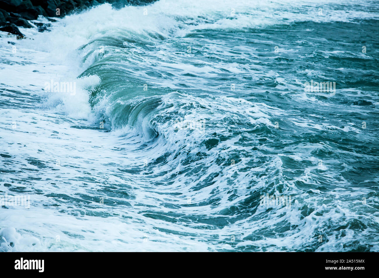 powerful ocean waves breaking natural background Stock Photo - Alamy
