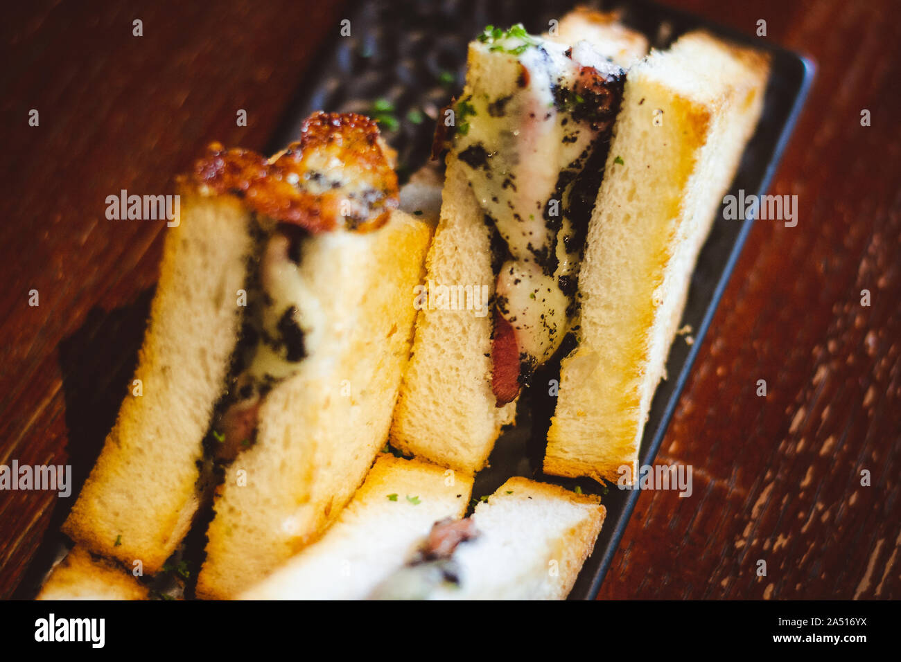 Truffle Tramezzini Melted mozzarella on tender beef bacon in brioche ...