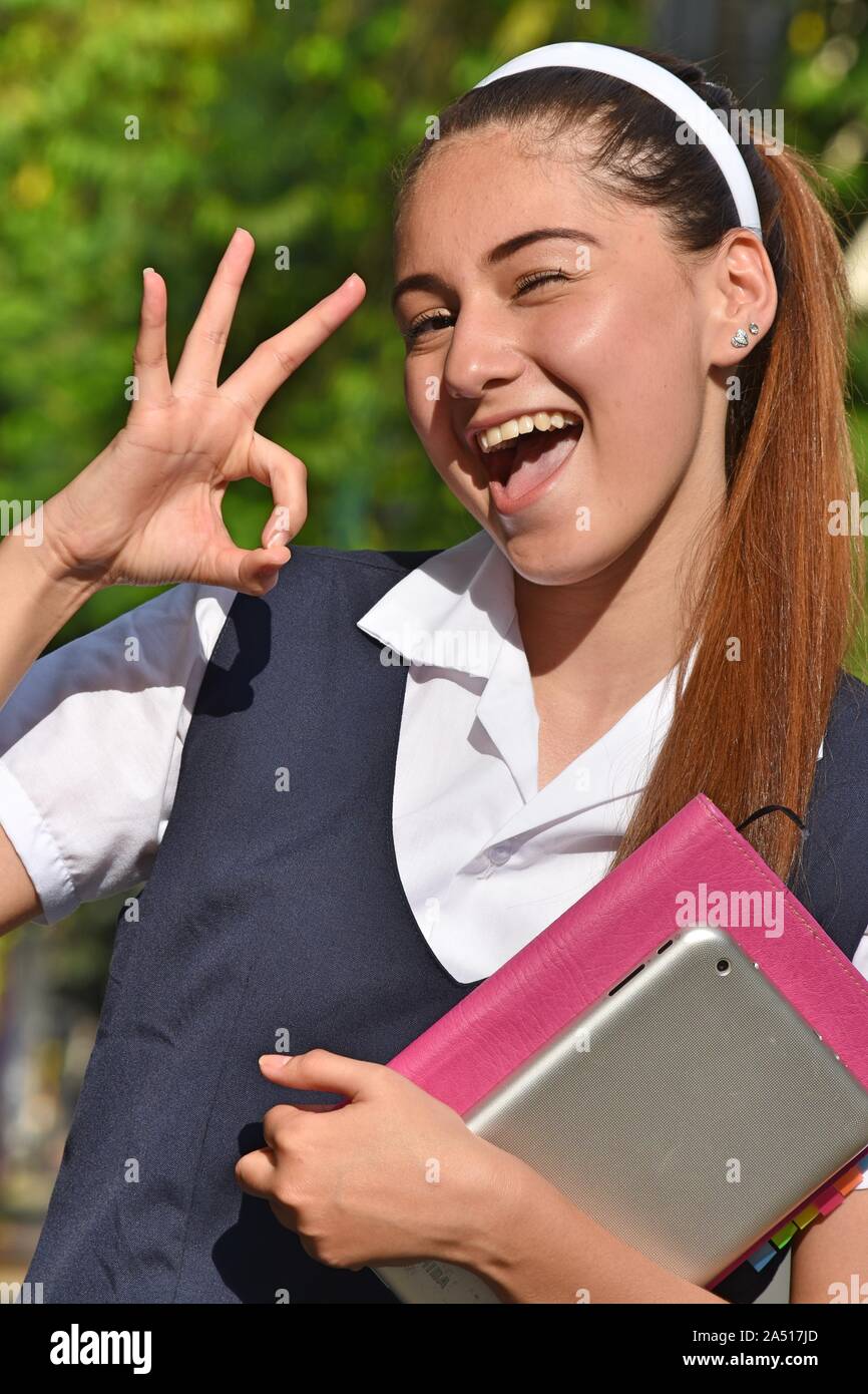 Okay Girl Student Wearing Uniform With Books Stock Photo - Alamy