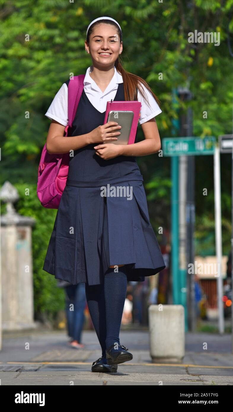 Female Student Walking To School Stock Photo - Alamy