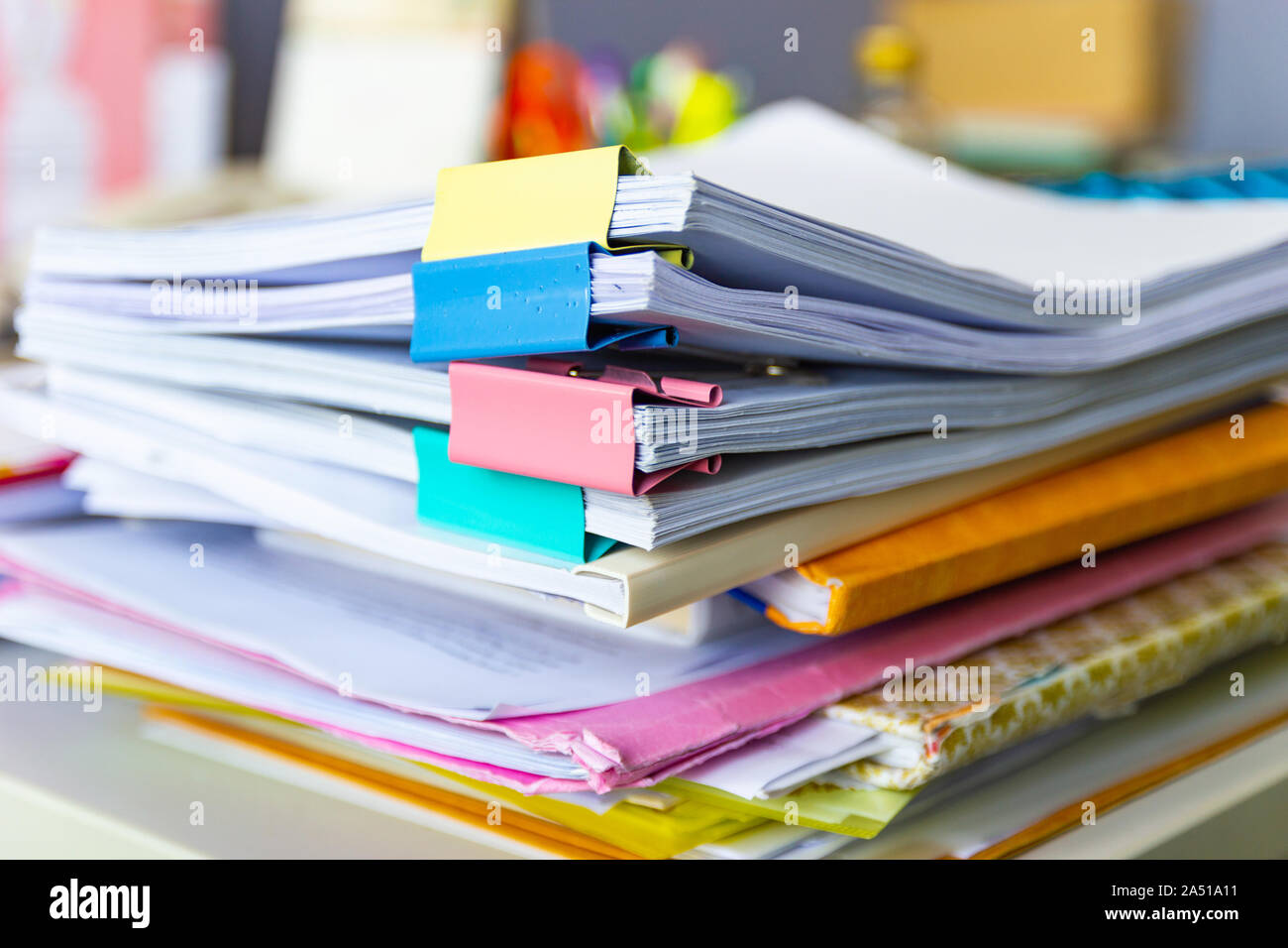 file folder and Stack of business report paper file on the table in a ...