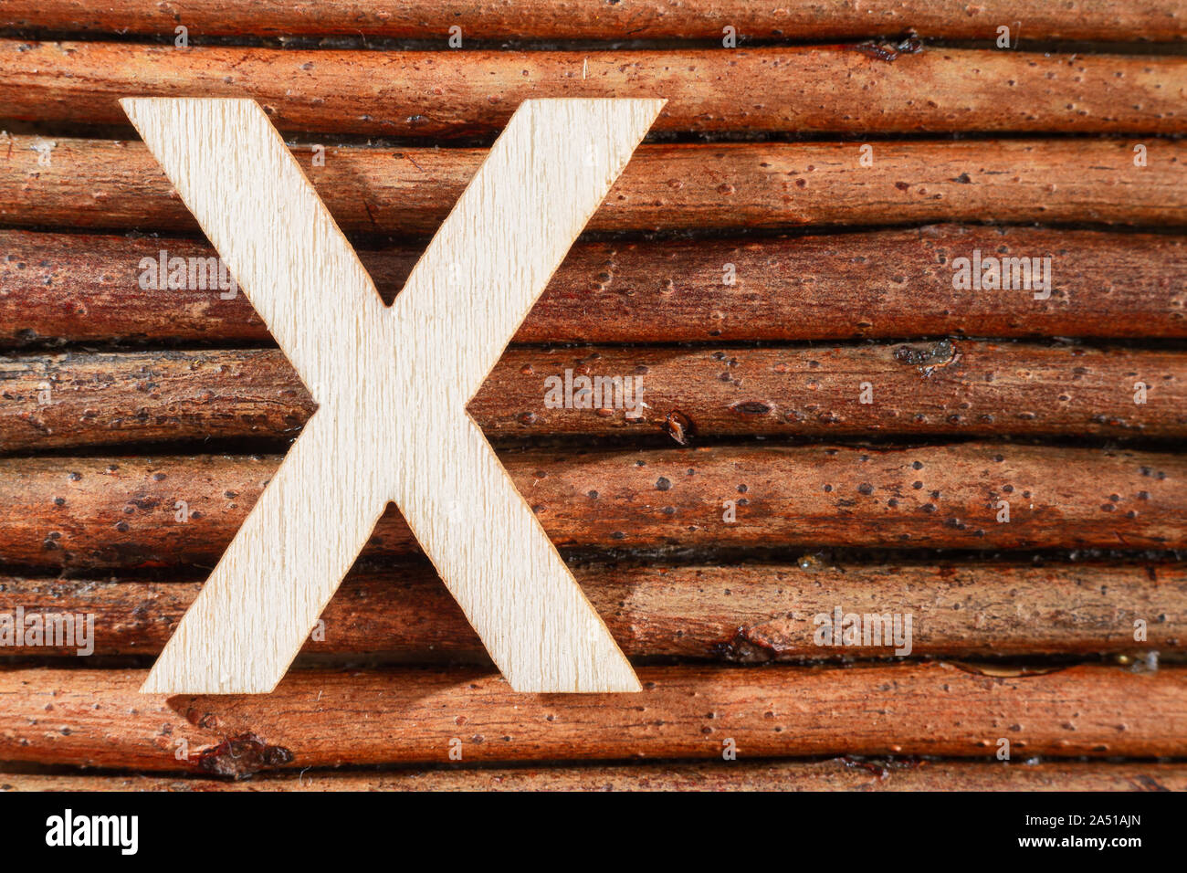 Letter X of wood-made alphabet, top view and space for text Stock Photo ...