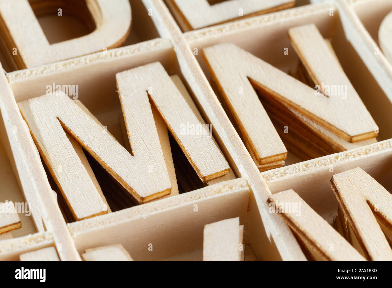 Alphabet letters in wooden box, top view Stock Photo - Alamy