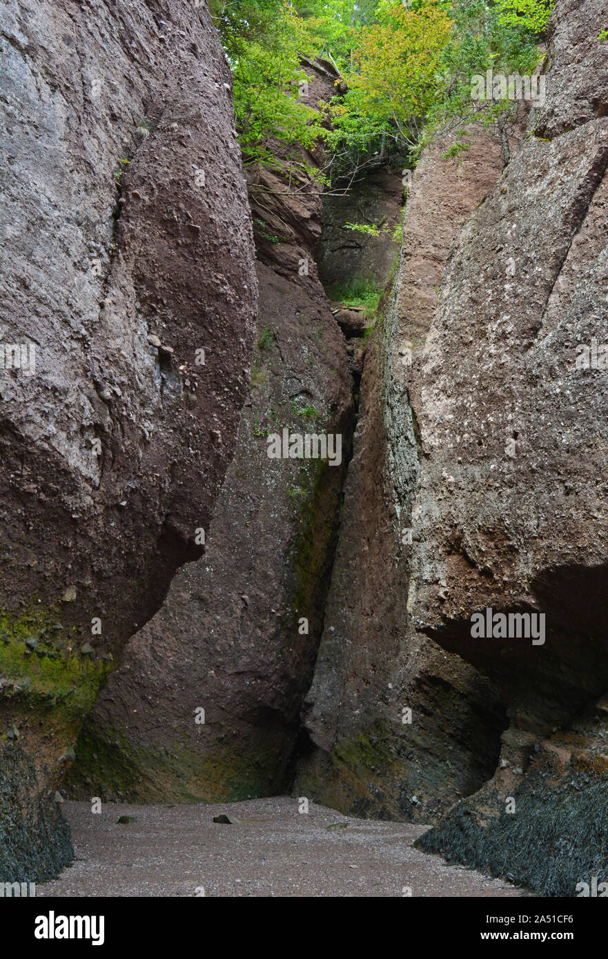 A hiding place between the giant rocks Stock Photo - Alamy