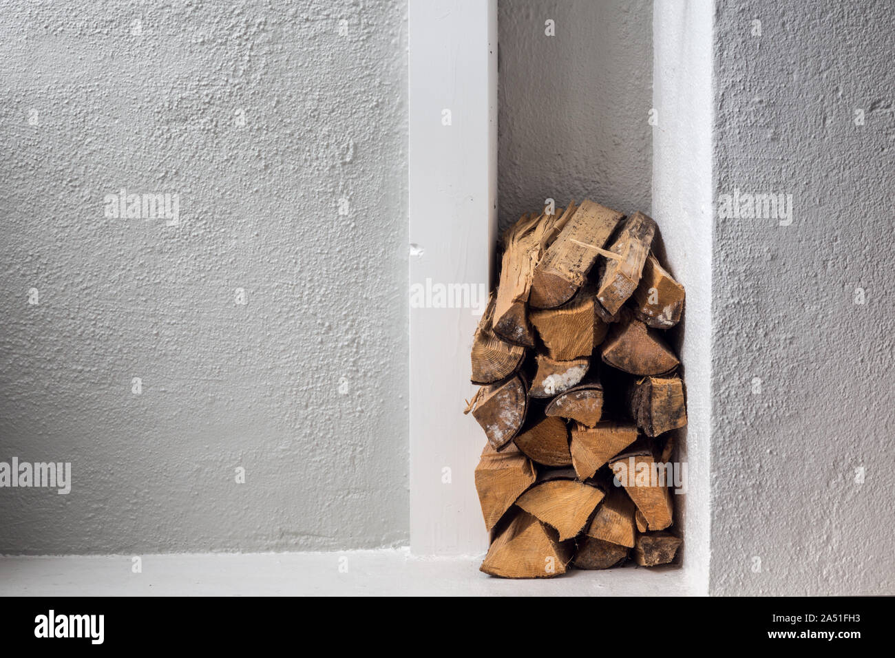 Interior firewood storage, Stack of firewood / woodpile in the room ...