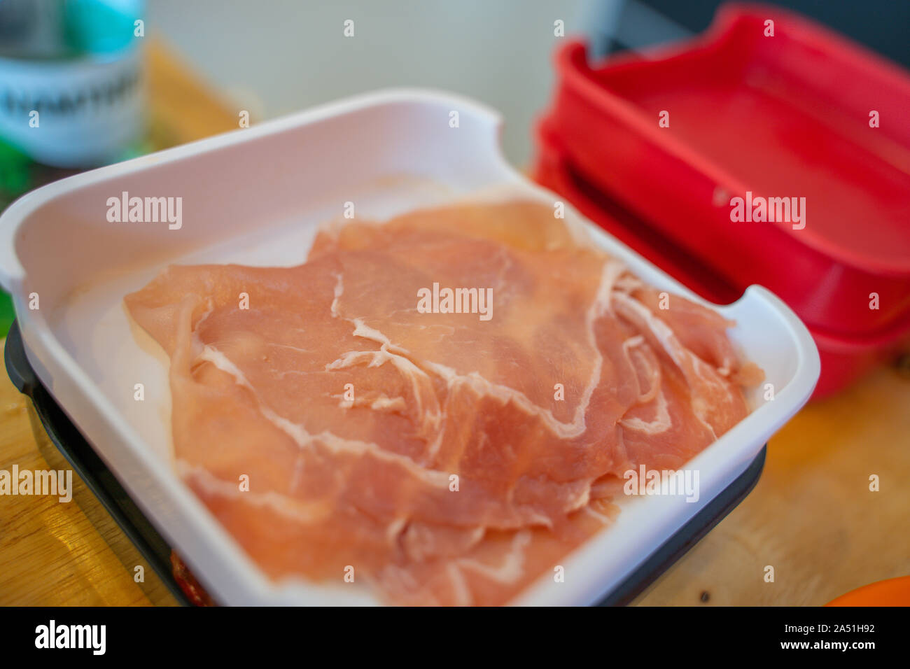 The sliced raw pork meat isolated on white background. Top view Stock ...