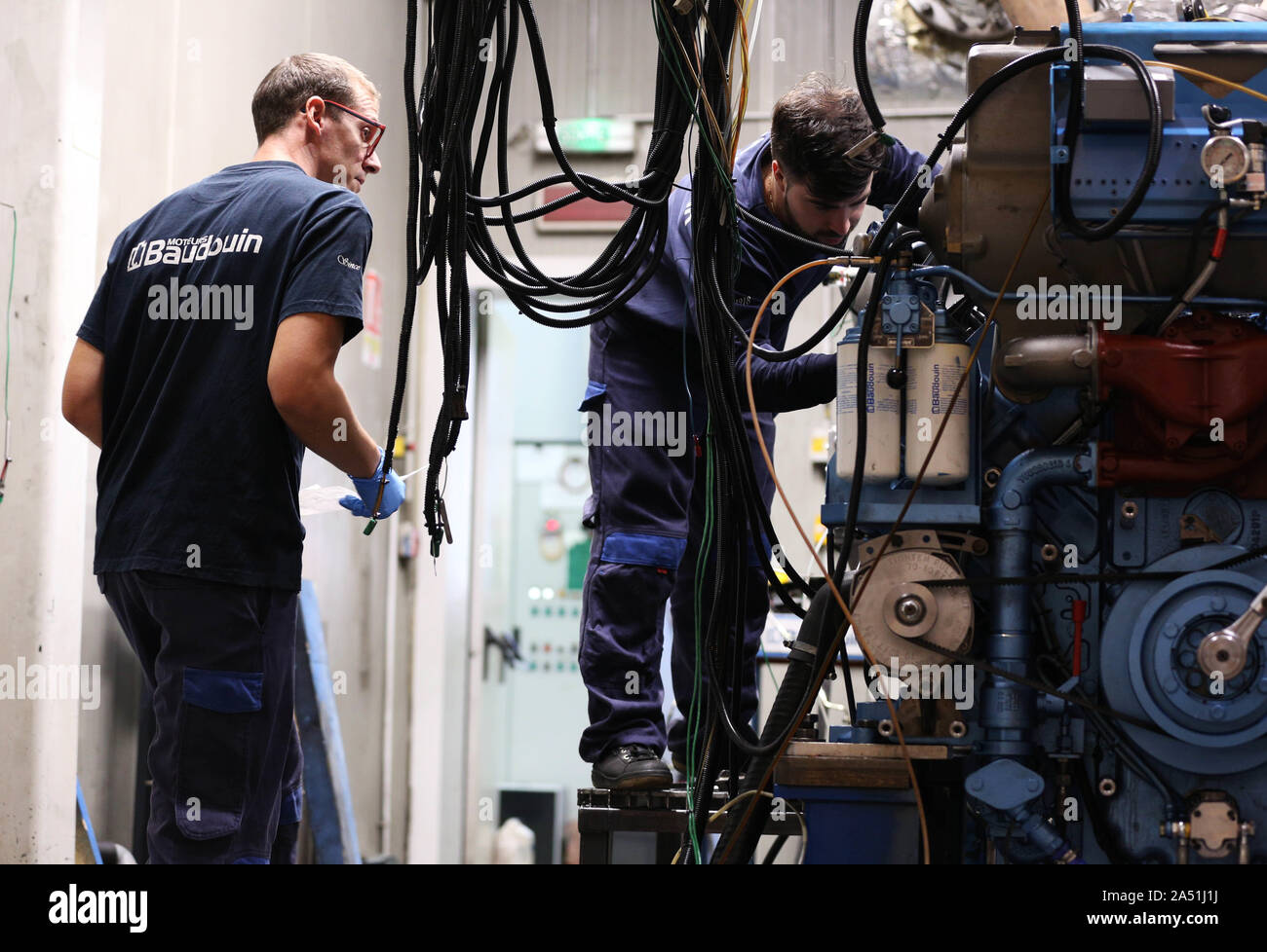 Cassis, France. 14th Oct, 2019. Workers work at the factory of the ...