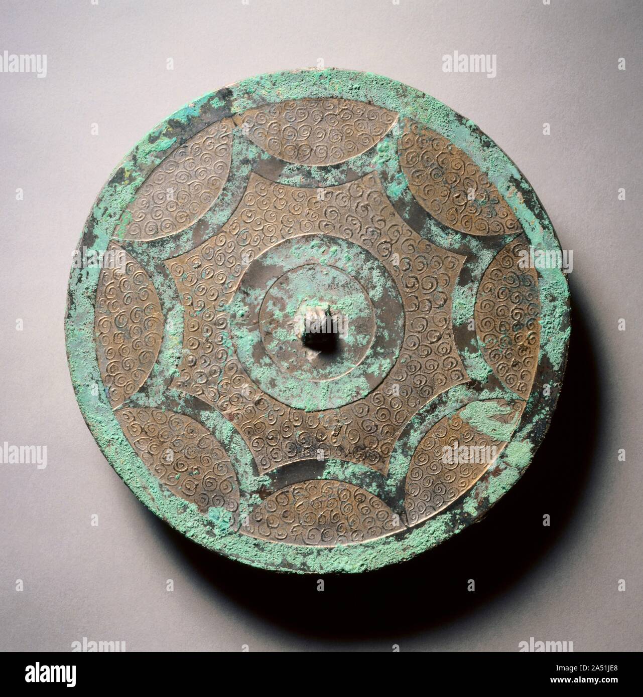 Mirror with Continuous Arcs against Whorl Pattern, 3rd Century BC Stock ...