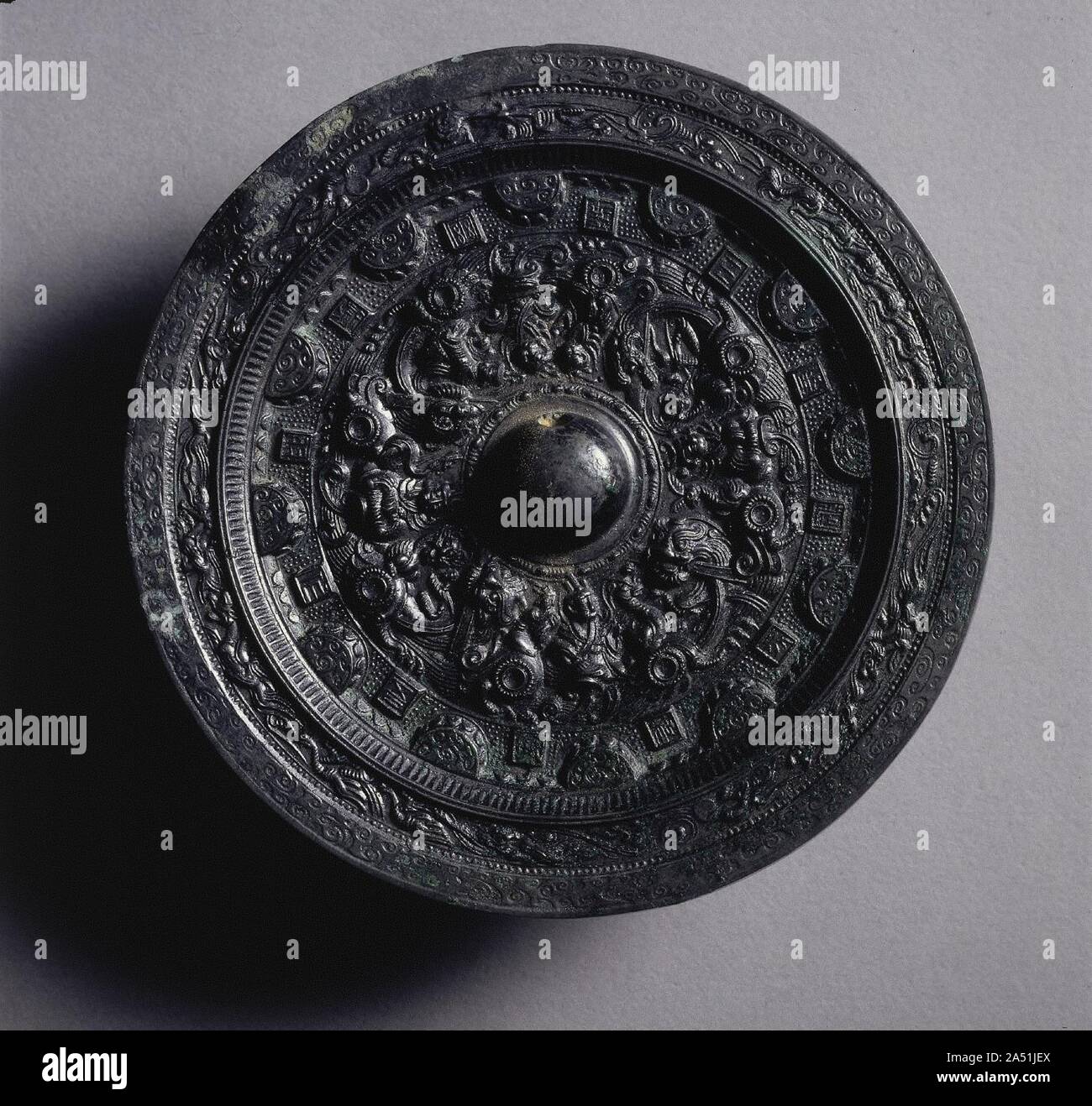 Mirror with Deities and Animals Surrounded by Rings of Squares and ...