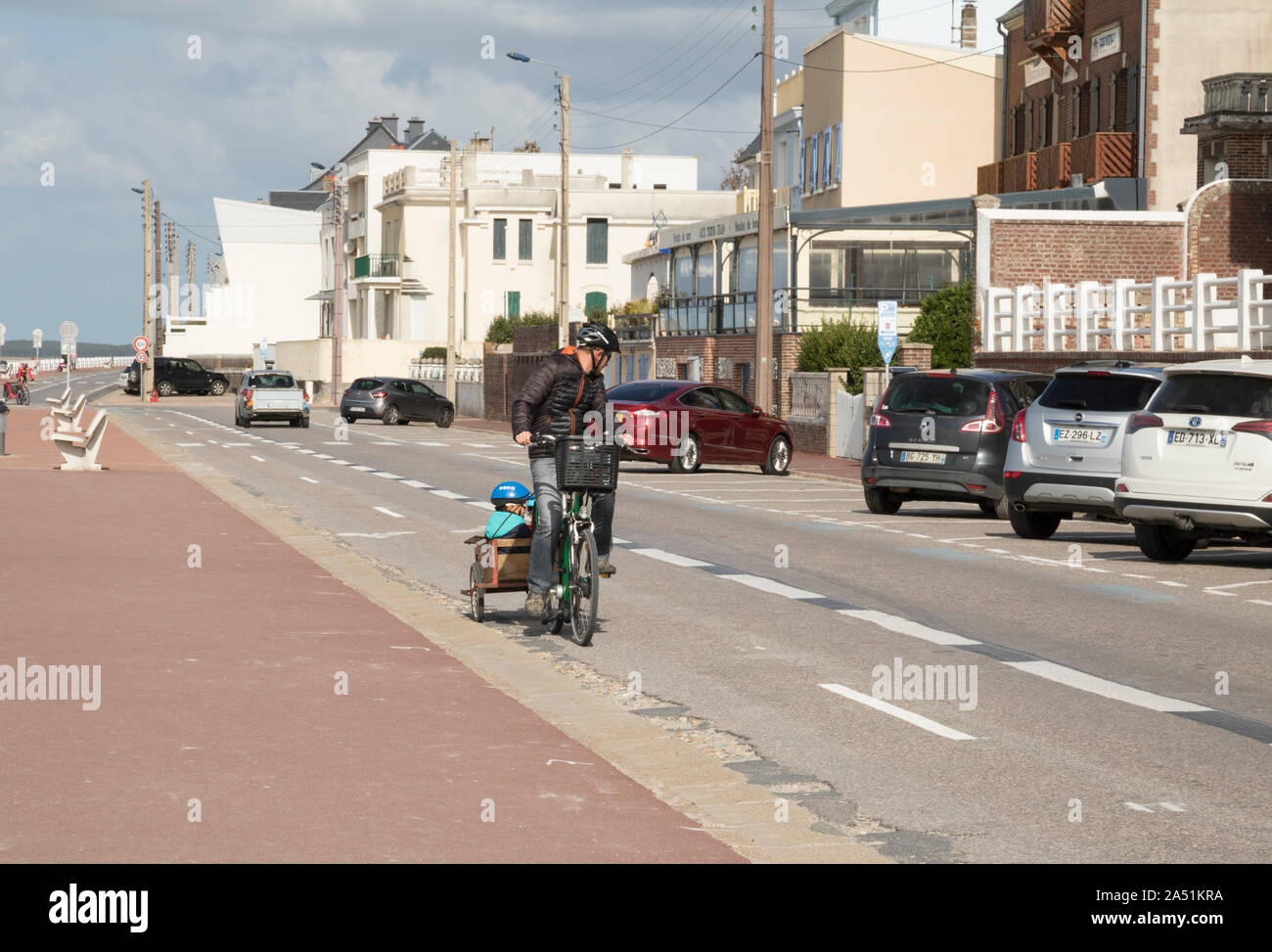 Cycle with trailer in cycle lane, children in trailer, Le Crotoy ...