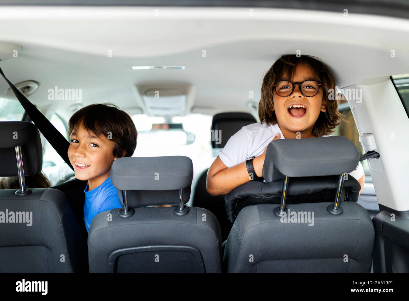 Riding in back of car hi-res stock photography and images - Alamy