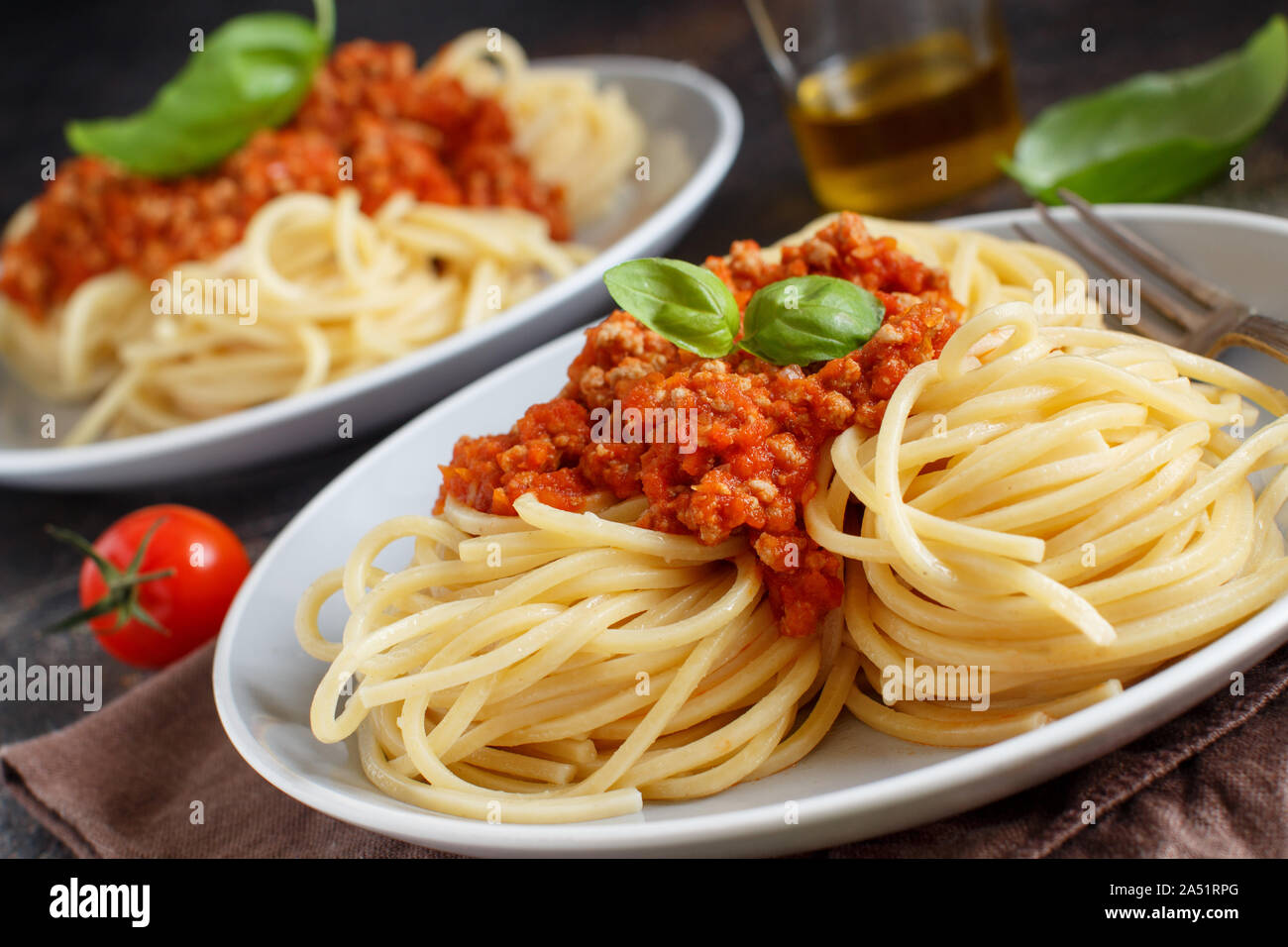 Spaghetti pasta with bolognese sauce with a fork close up Stock Photo ...