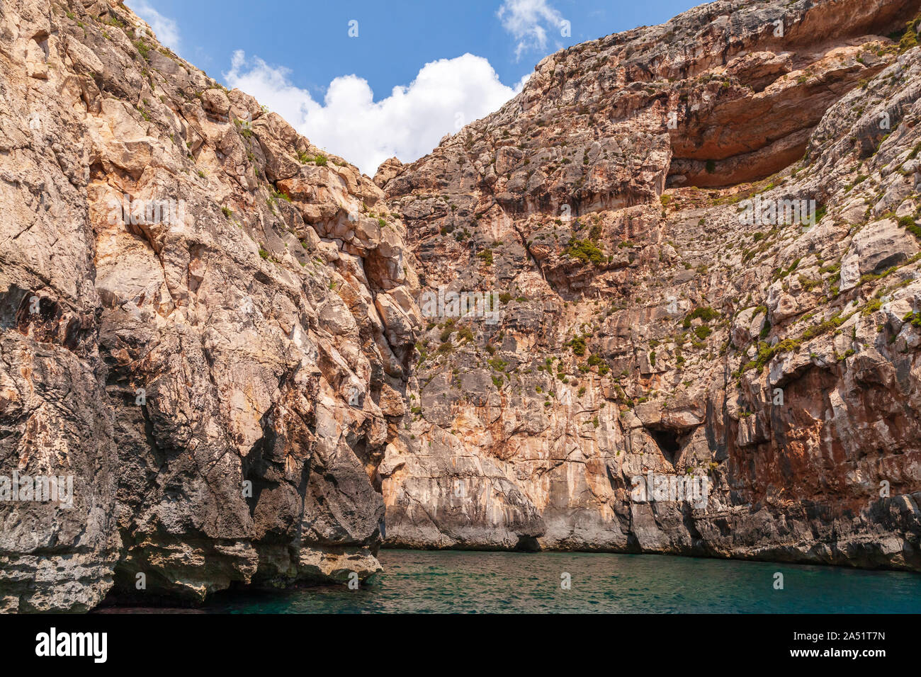 Blue Grotto, Malta. Scenic coastal landscape with red rocks and sea ...