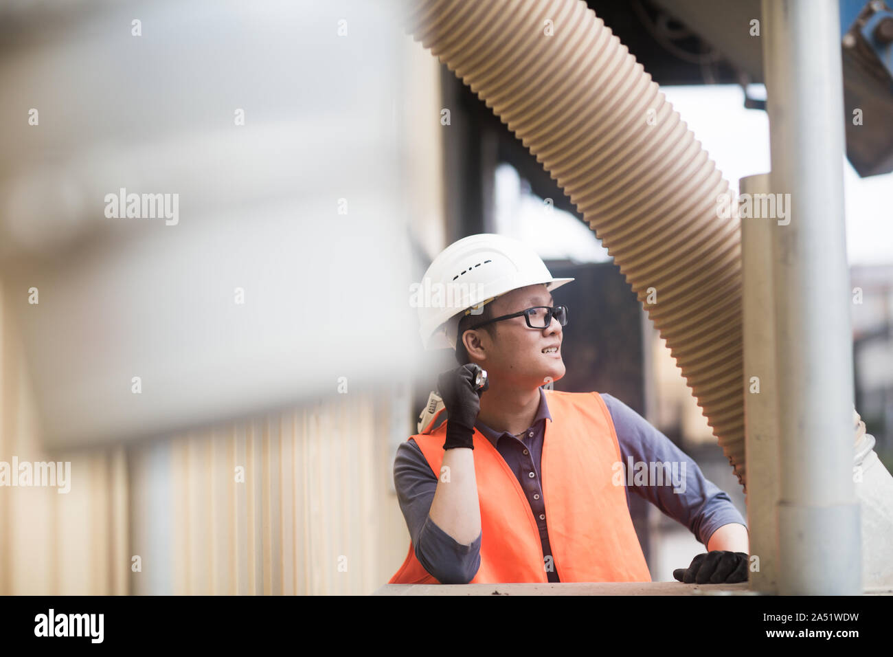 young worker in a concrete factory Stock Photo - Alamy