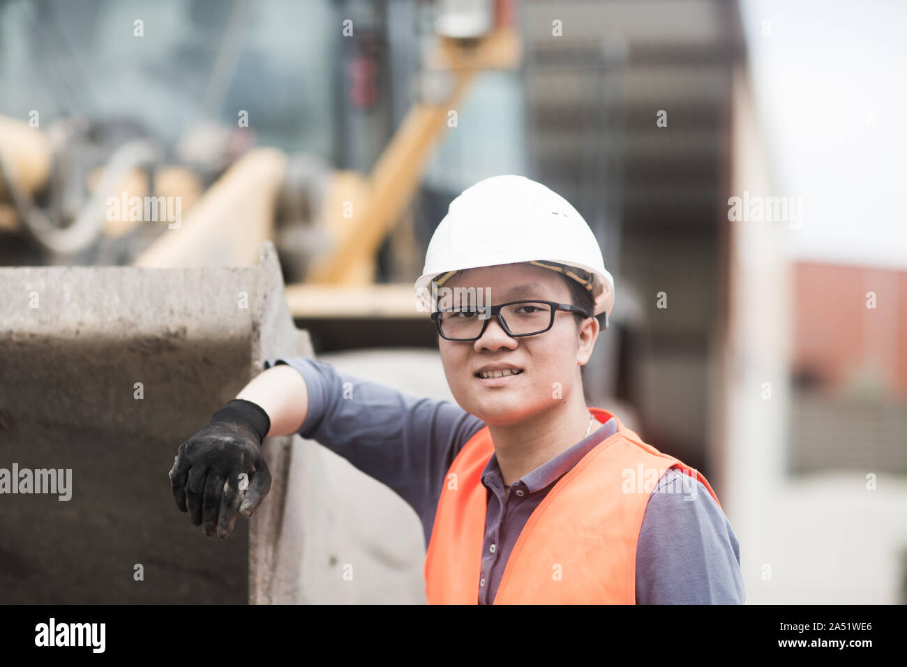 young worker in a concrete factory Stock Photo - Alamy