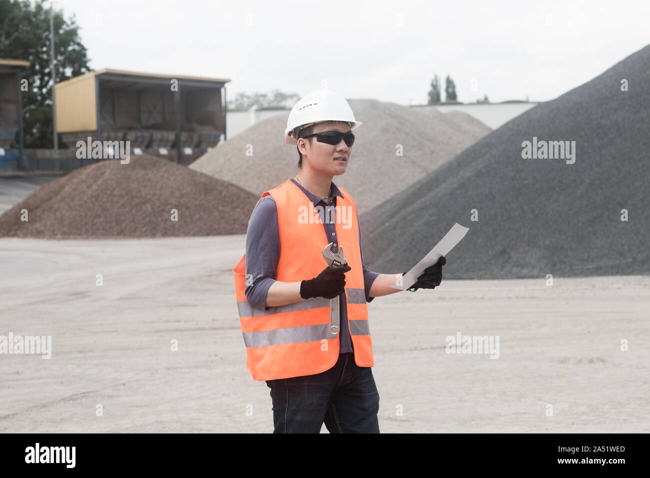 young worker in a concrete factory Stock Photo - Alamy