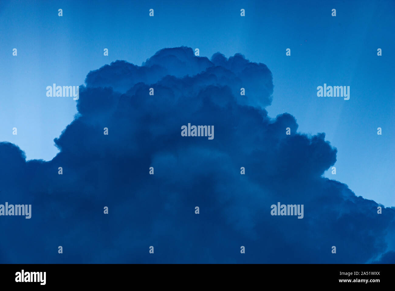 Storm cloud formation of anvil clouds Stock Photo - Alamy