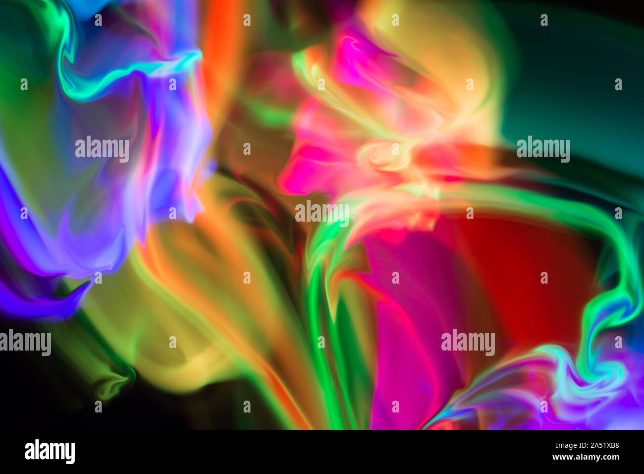 Fluid light painting with vibrant colors Stock Photo - Alamy