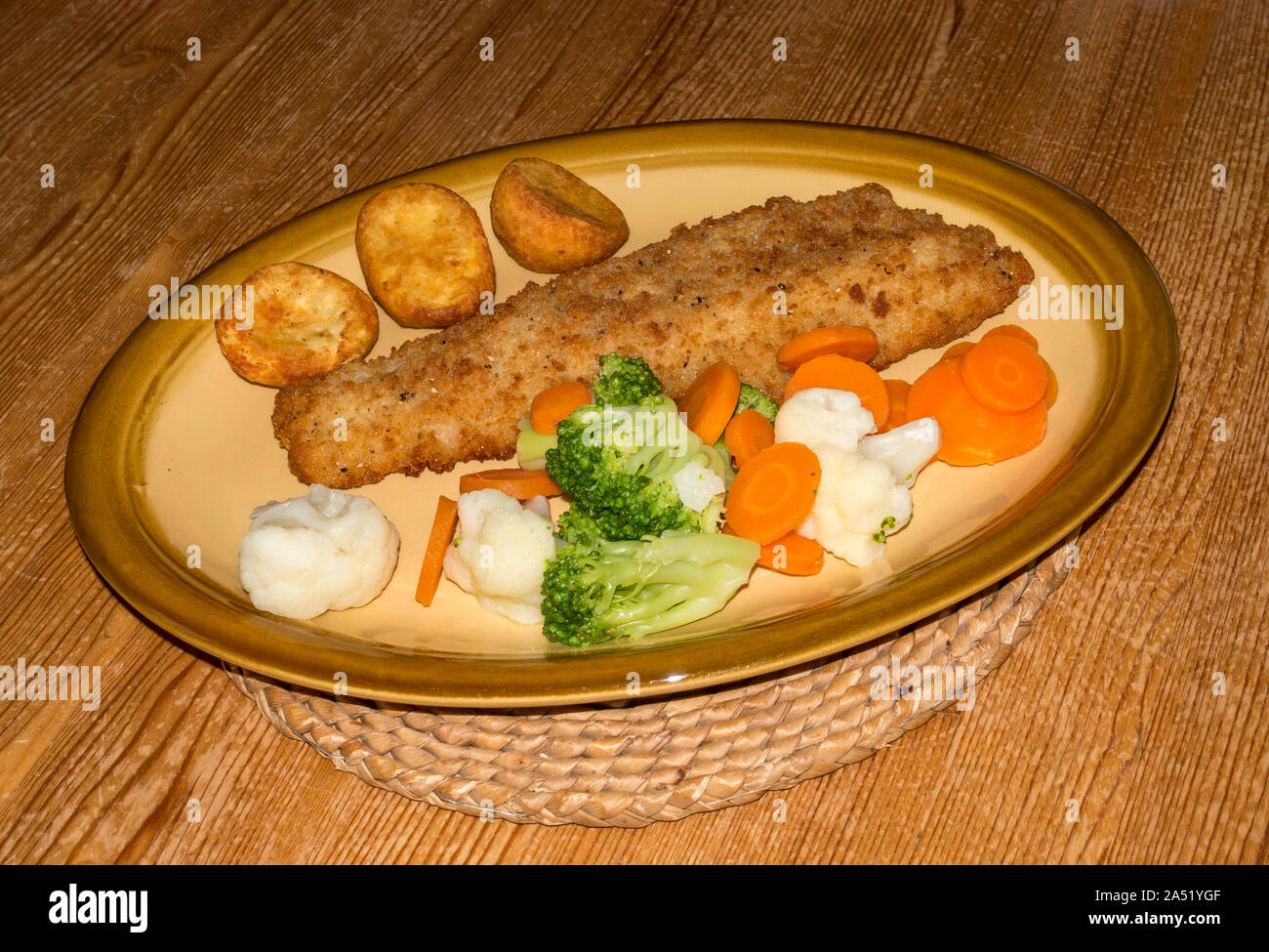 Lemon and black pepper fish dinner Stock Photo - Alamy