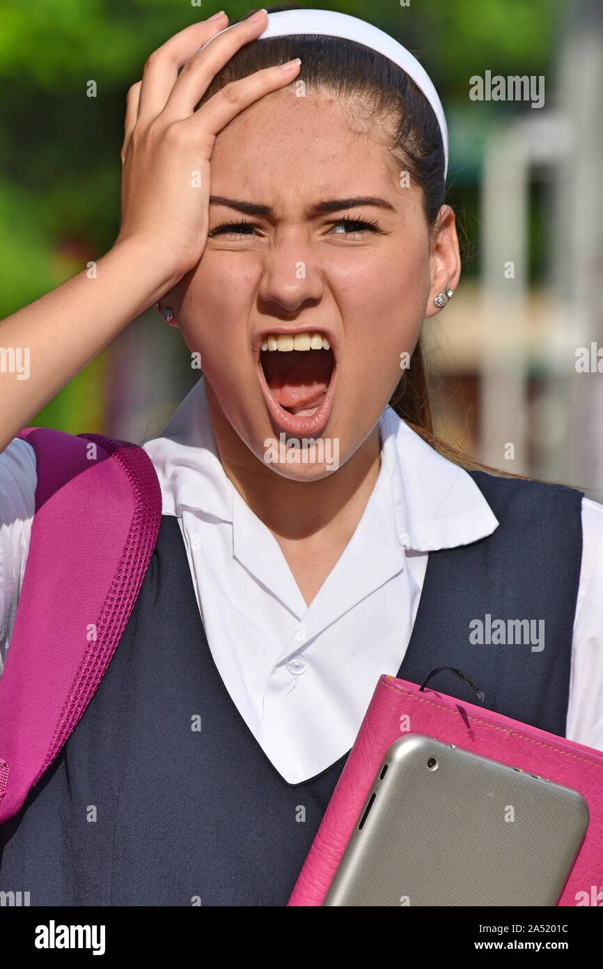 Stressed Girl Student Wearing School Uniform Stock Photo - Alamy