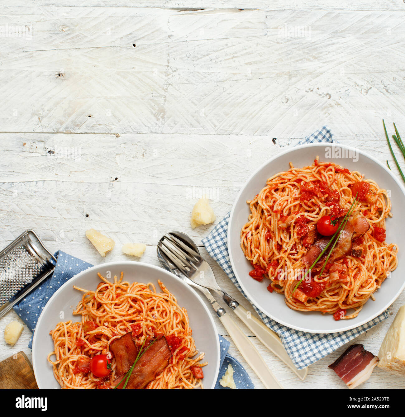 Spaghetti alla amatriciana on a wooden table top view Stock Photo - Alamy