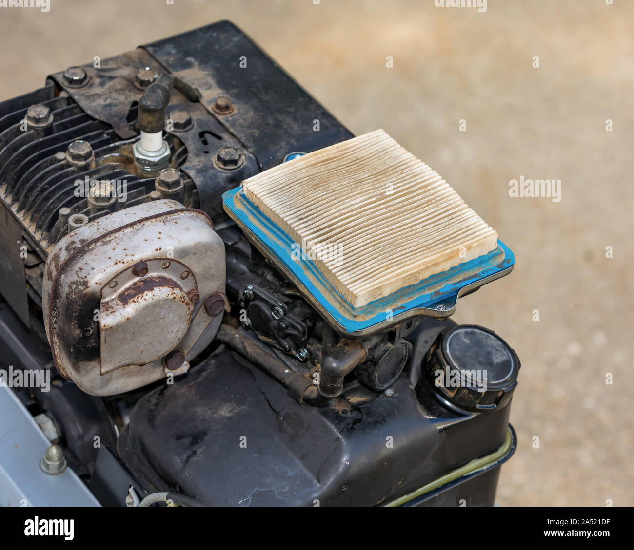 Dirty air filter on small gas engine of garden tiller. Concept of home ...