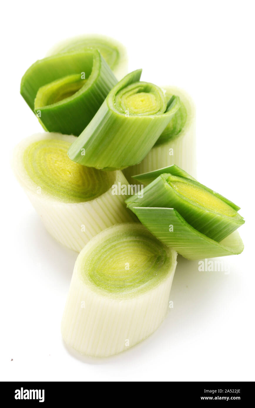 Raw Pieces Of Leek Isolated On White Stock Photo - Alamy