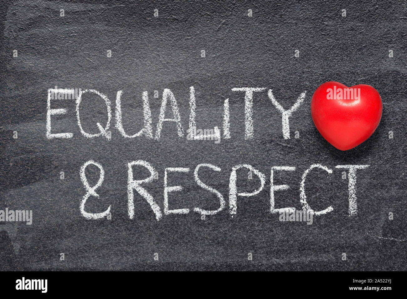 equality and respect phrase written on chalkboard with red heart symbol ...