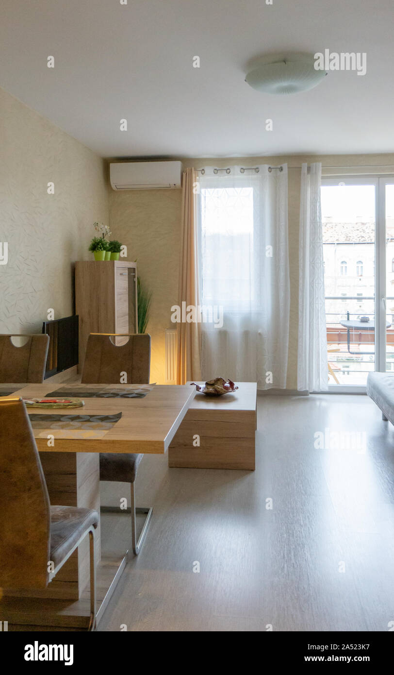 modern apartment interior view, dining table Stock Photo - Alamy