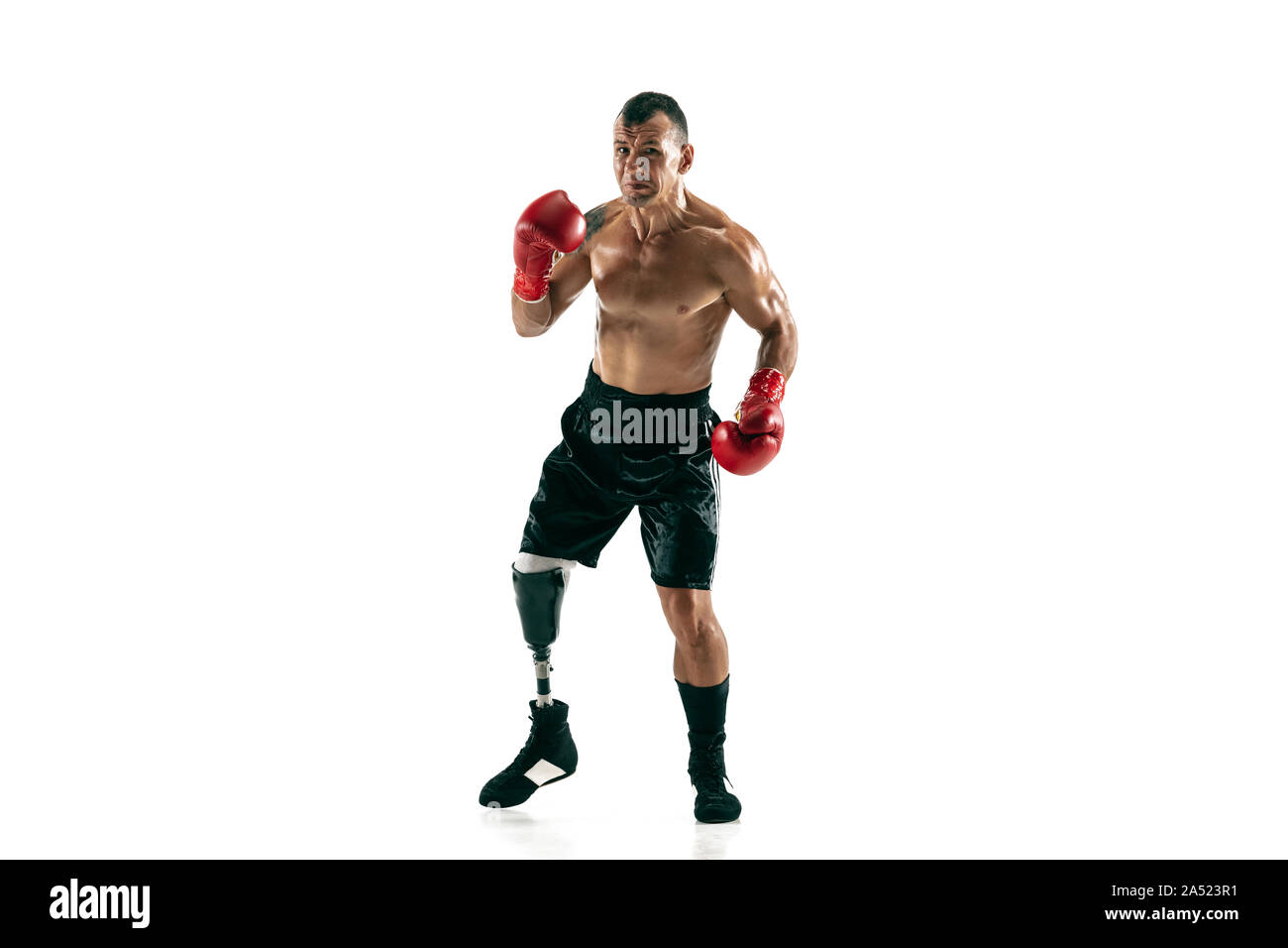 Full length portrait of muscular sportsman with prosthetic leg, copy ...