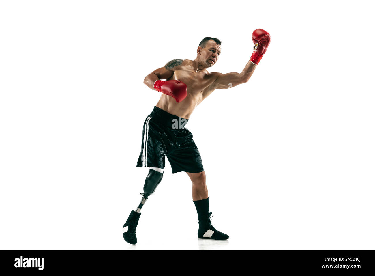 Full length portrait of muscular sportsman with prosthetic leg, copy ...