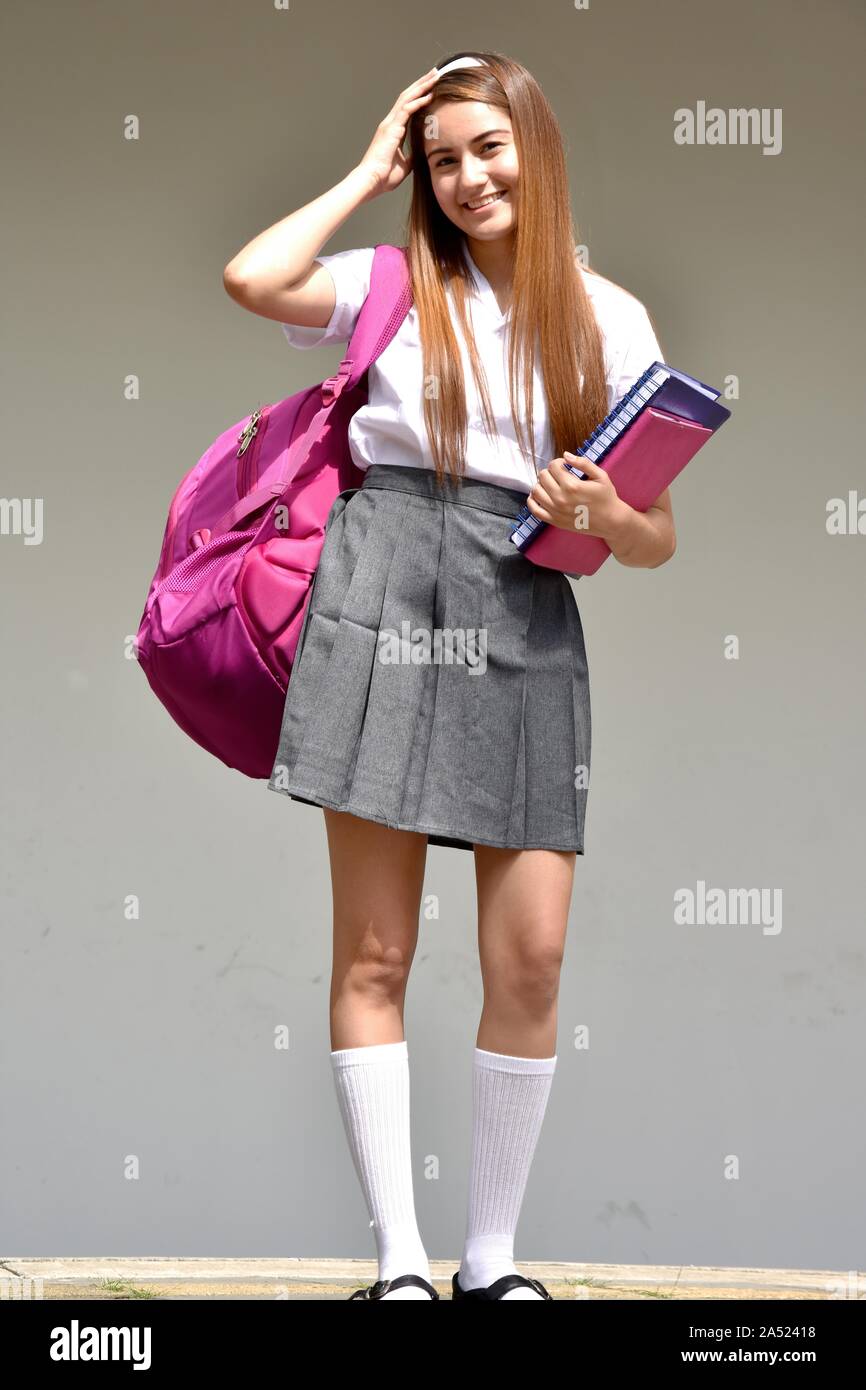Female Student Holding Books Stock Photo - Alamy