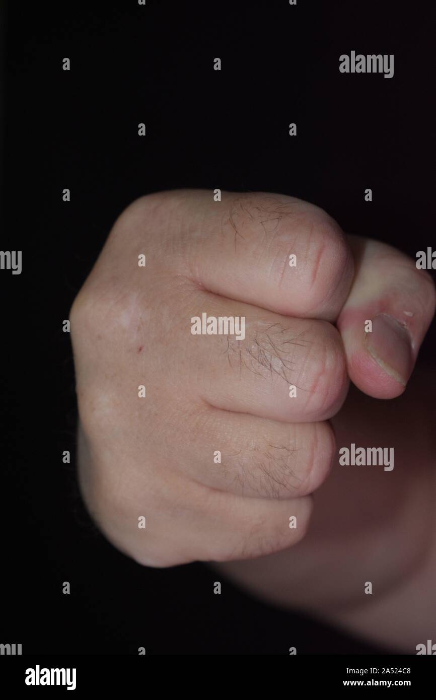 Hand Gesture Showing Vertical Punch Stock Photo - Alamy